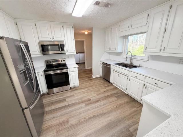 1965 Deer Creek Trail, Buford, GA 30519 | MLS #7740 | Compass