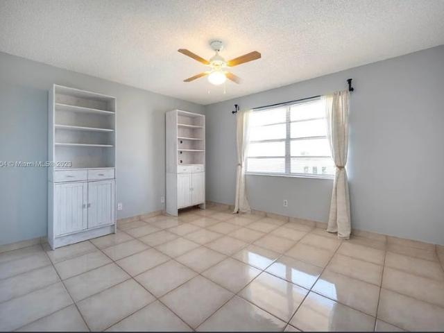 1 bedroom and private bathroom with walk in closet