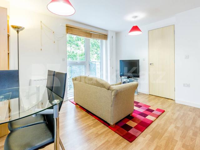 1 bedroom apartment located within a gated development with a balcony