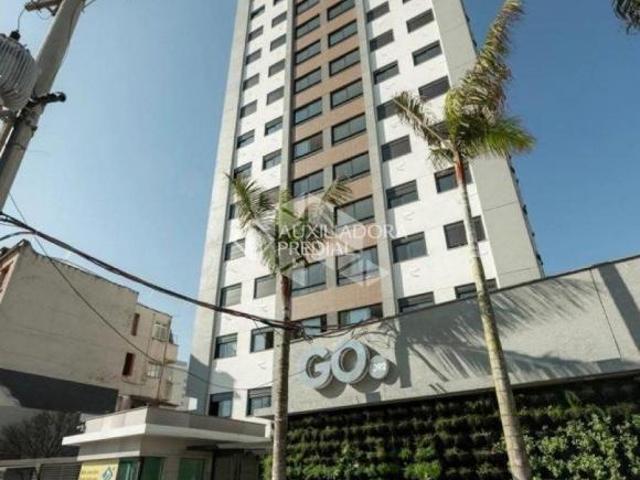 1 dormitório Suite, living, área de serviço, 1 box coberto e escriturado
