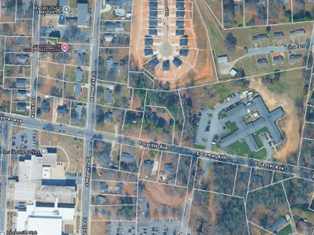 1,2,3 E Center Ave