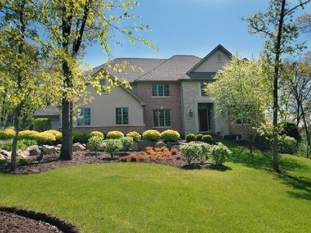 1.61 Acres of Beauty. the house & the wooded site