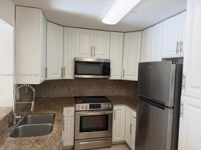 200 Palm Cir W, Unit 107, Pembroke Pines, FL 33025 | MLS #A11982 | Compass