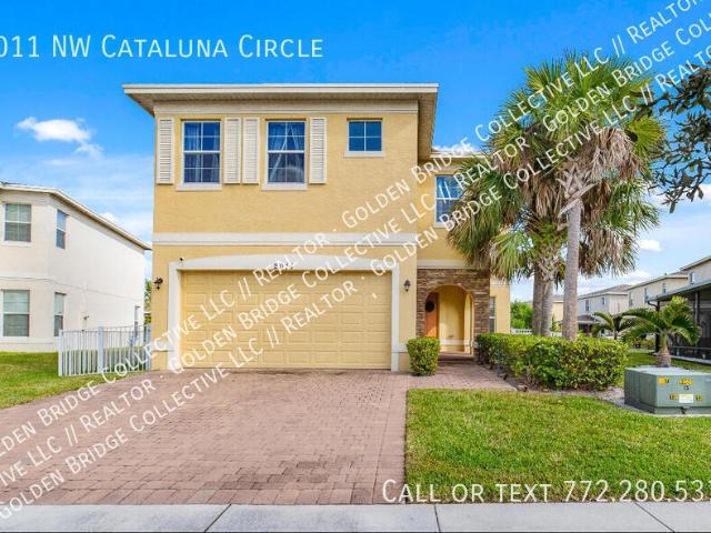 2011 NW Cataluna Circle, 4 beds, 2 full and 1 half baths