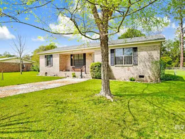 202 W JACKSON ST, SUMMERDALE, AL 36580 Single Family Residence.