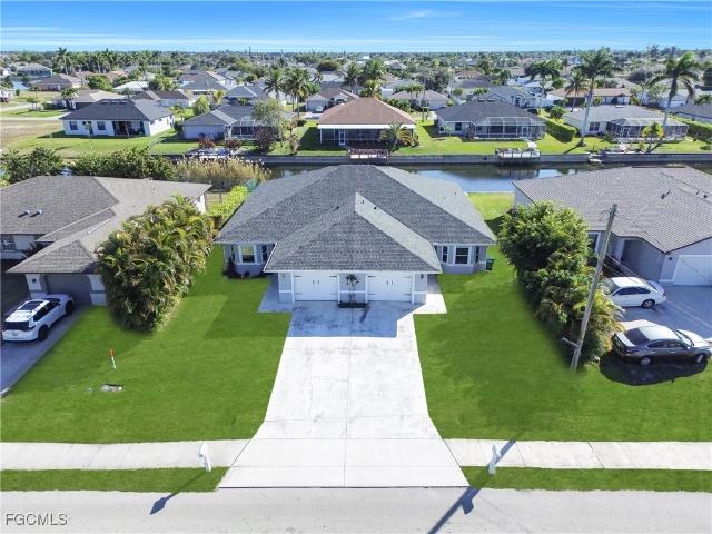 2032 NE 6th St, Cape Coral, FL 33909 | MLS #2026005 | Compass