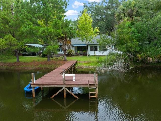 203 NW Highway 441, Micanopy, FL 32667 | MLS #OM704847 | Compass
