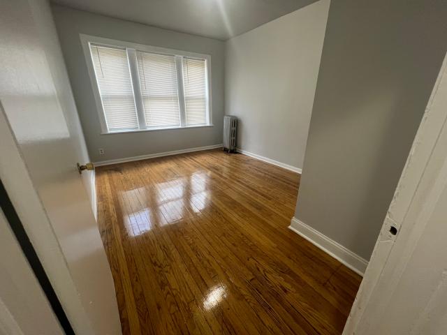 2049 E 68th St, Unit 1E, Chicago, IL 60649 | MLS #12411 | Compass