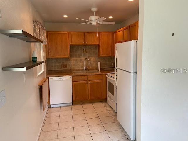 205 Andover Pl N, Unit 104, Sun City Center, FL 33573 | MLS #TB8497 | Compass