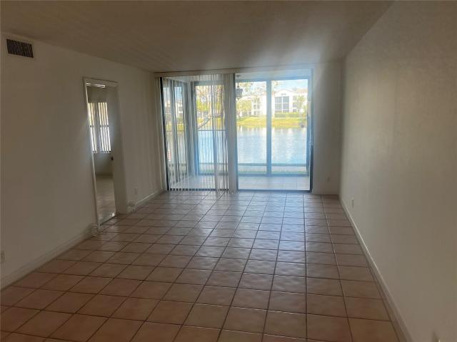 208 Lake Pointe Dr, Unit 105, Oakland Park, FL 33309 | MLS #F10554 | Compass
