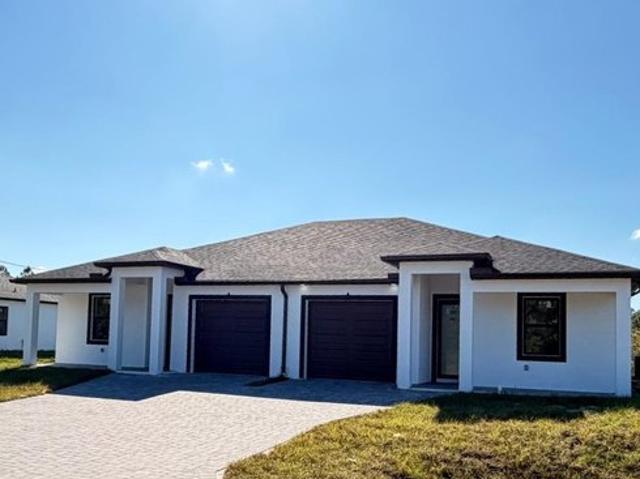 209 211 W 12th St, Lehigh Acres, FL 33972