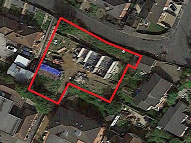 20 bedroom property with land for sale