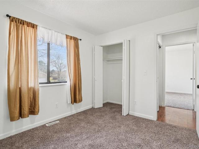 2105 Coronado Pkwy N, Unit D, Denver, CO 80229 | MLS #8241