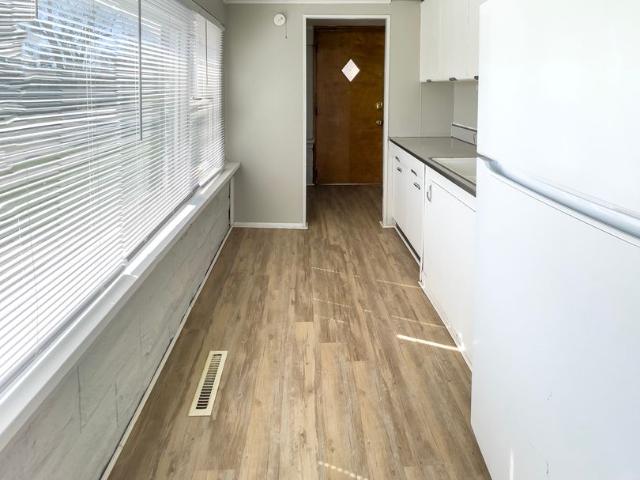 2106 W. Main St. Whim & Proper LLC