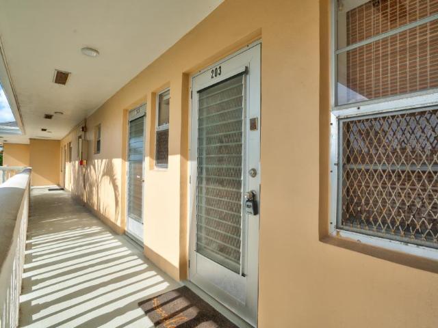 2111 NE 1st Ct, Unit 203, Boynton Beach, FL 33435 | MLS #R11027 | Compass