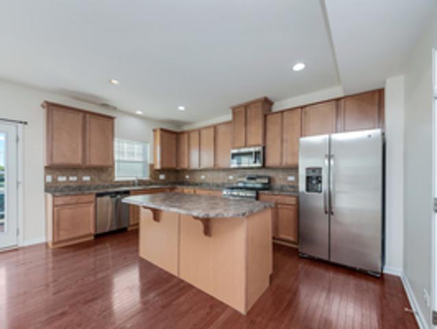 212 N Commerce St, Aurora, IL 60504 | MLS #12619 | Compass