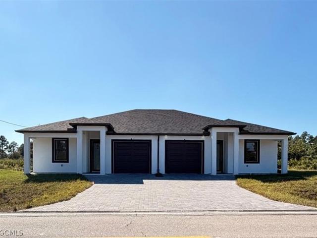 213 215 W 12th St, Lehigh Acres, FL 33972