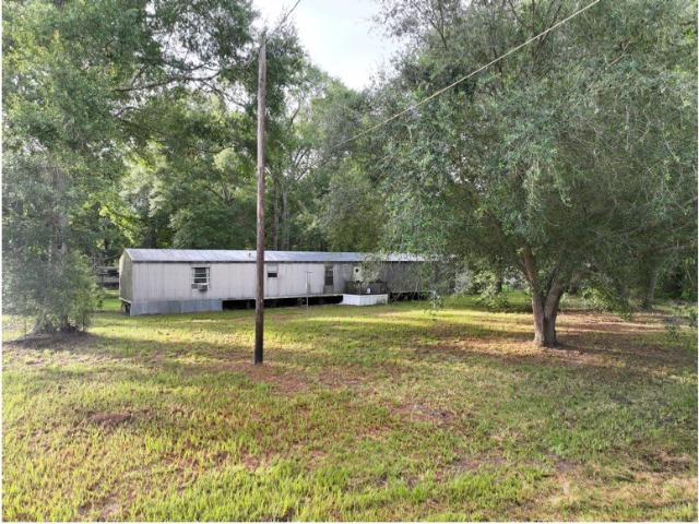 214 Cr 2800 Cleveland, TX 77327 | MLS #85613 | Compass