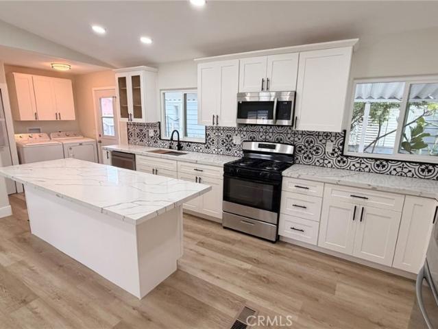 215 S Sullivan St, Unit 220, Santa Ana, CA 92704 | MLS #PW26118