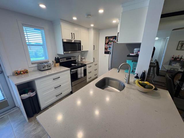 2161 NE 1st Ct, Unit 206, Boynton Beach, FL 33435 | MLS #R11167 | Compass
