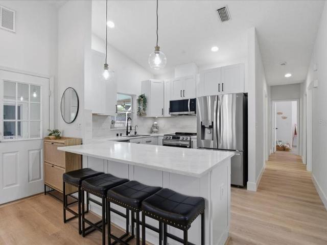 220 19th St, Palm Harbor, FL 34683 | MLS #TB8490 | Compass