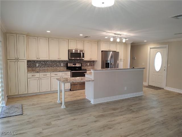 2220 SE 7th St, Cape Coral, FL 33990 | MLS #2026001 | Compass