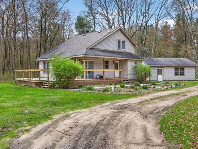 22597 Tamarack Rd, Howard City, MI 49329