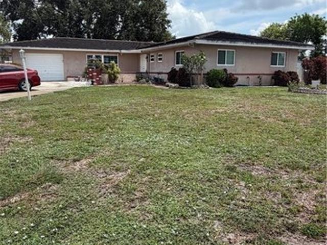 225 Lake Dr, Lehigh Acres, FL 33936
