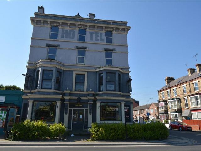 22 bedroom property with land for sale