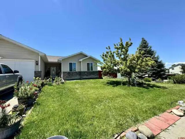 2308 AMERICAN WAY, MONTROSE, CO 81401 Single Family Residence.