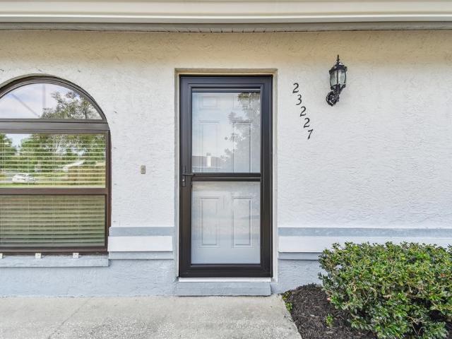 23227 Club Villas Dr, Unit 38, Land O' Lakes, FL 34639 | MLS #TB8347 | Compass