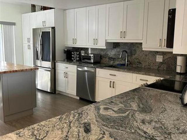 2345 Deer Creek Woodlands Way, Deerfield Beach, FL 33442