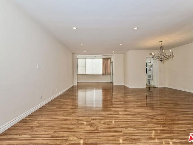 237 N Almont Drive 303