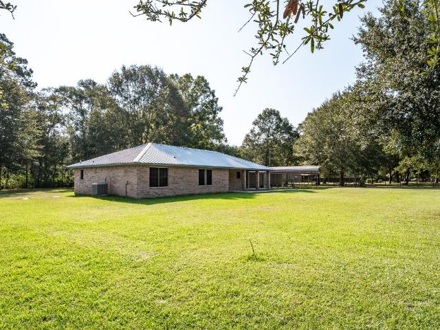 27 County Road 3371, Cleveland, TX 77327 | MLS #16512 | Compass