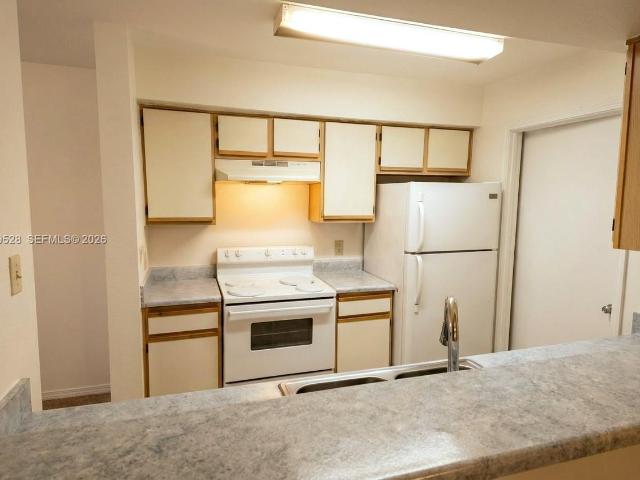2420 NW 33rd St, Unit 1011, Oakland Park, FL 33309 | MLS #A11926 | Compass