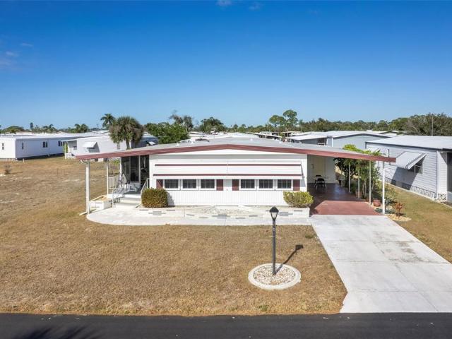 244 El Prado, North Port, FL 34287 | MLS #TB8471 | Compass