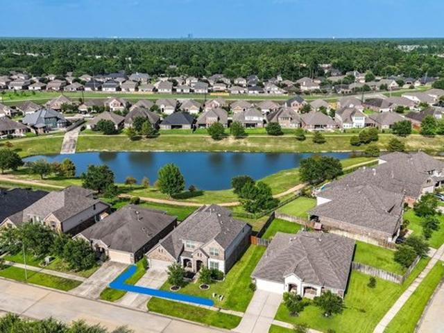 24506 Raven Cliff Falls Dr, Tomball, TX 77375