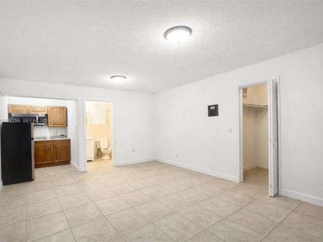 2471 NW 18th Ter, Unit A, Miami, FL 33125 | MLS #A11992 | Compass