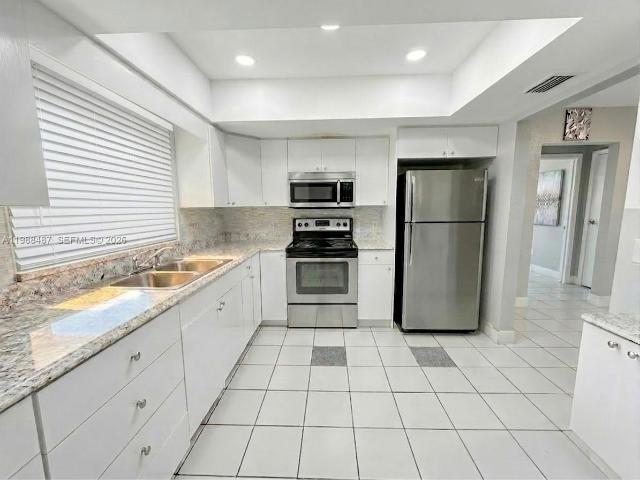 2498 NW 98th Ln, Sunrise, FL 33322 | MLS #A11988 | Compass