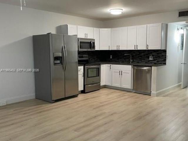 251 SW 132nd Way, Unit 204H, Pembroke Pines, FL 33027 | MLS #A11993 | Compass