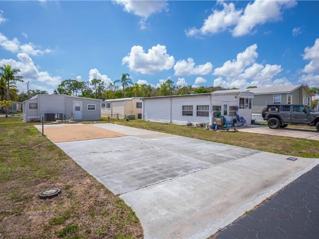 25 La Fonda Ln, North Fort Myers, FL 33903 | MLS #2026012 | Compass