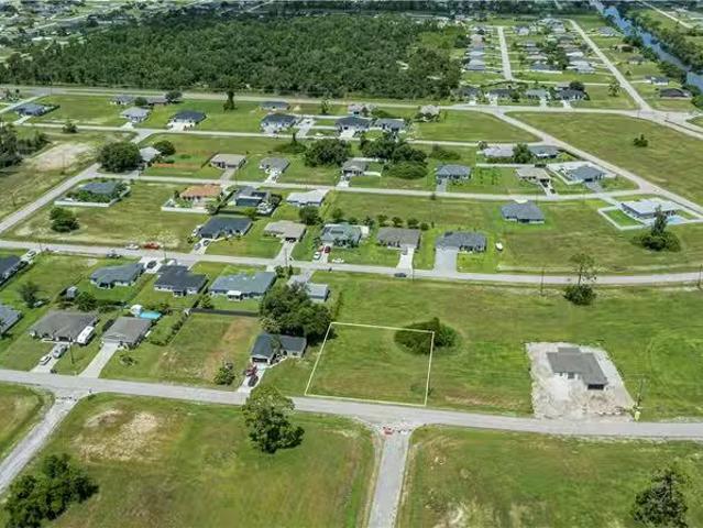 2600 NW 14TH AVE, CAPE CORAL, FL 33993 Single Family Residence.