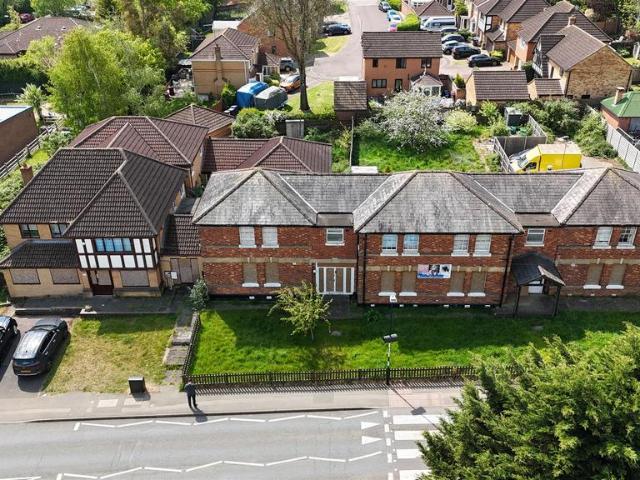 26 bedroom property with land for sale