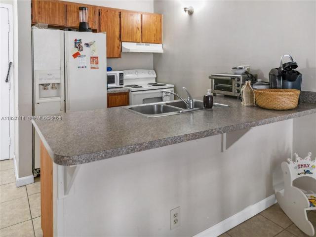 2701 Riverside Dr, Unit 516B, Coral Springs, FL 33065 | MLS #A11933 | Compass