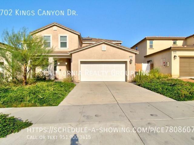 2702 Kings Canyon Dr 5 beds, 3 full and 1 half baths