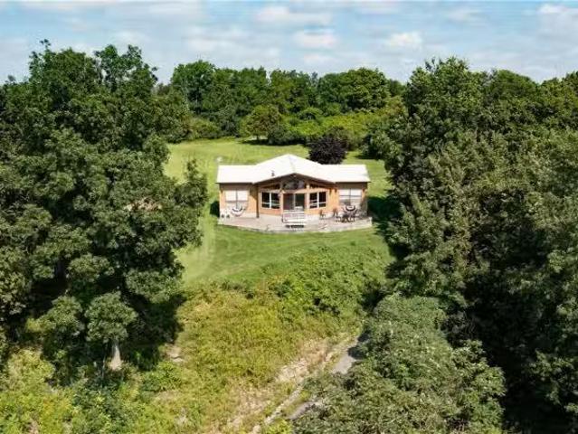 27560 COUNTY ROUTE 57, THREE MILE BAY, NY 13693 Single Family.