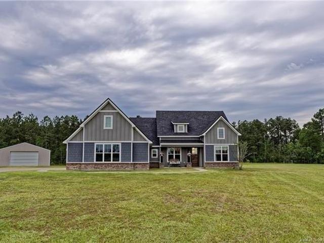 2751 N White Rose Lane, Moss Bluff, LA 70611