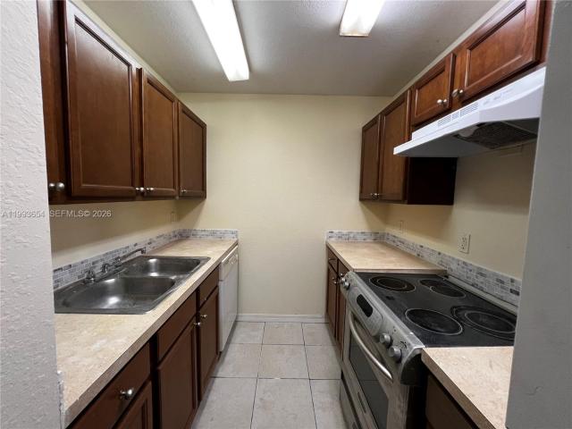 2822 NW 55th Ave, Unit 1D, Lauderhill, FL 33313 | MLS #A11993 | Compass