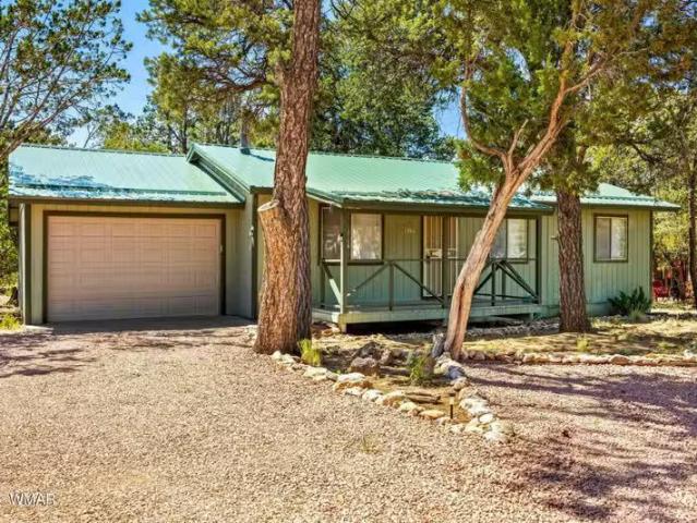 2938 WILDCAT TRL, OVERGAARD, AZ 85933 Single Family Residence.