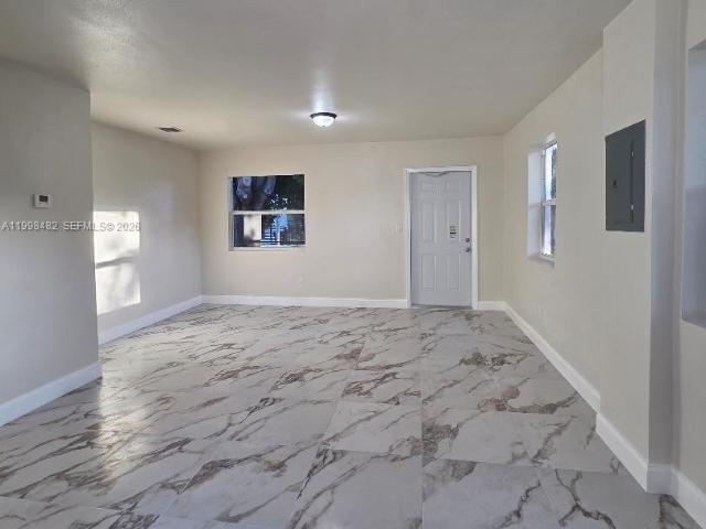 295 NW 48th St, Miami, FL 33127 | MLS #A11998 | Compass